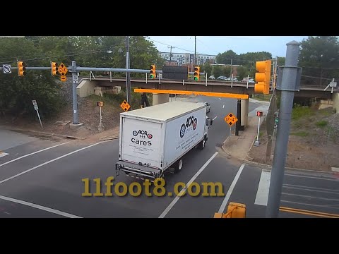 Boxtruck crash sprays debris at the 11foot8+8 bridge - 11 FOOT 8